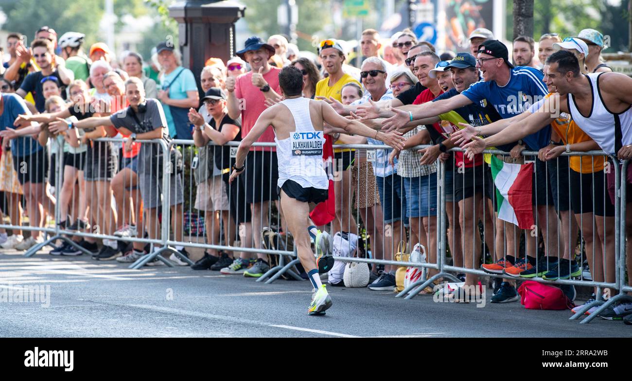 Moath Alkhawaldeh of Jordan high five to the fans while competing in ...