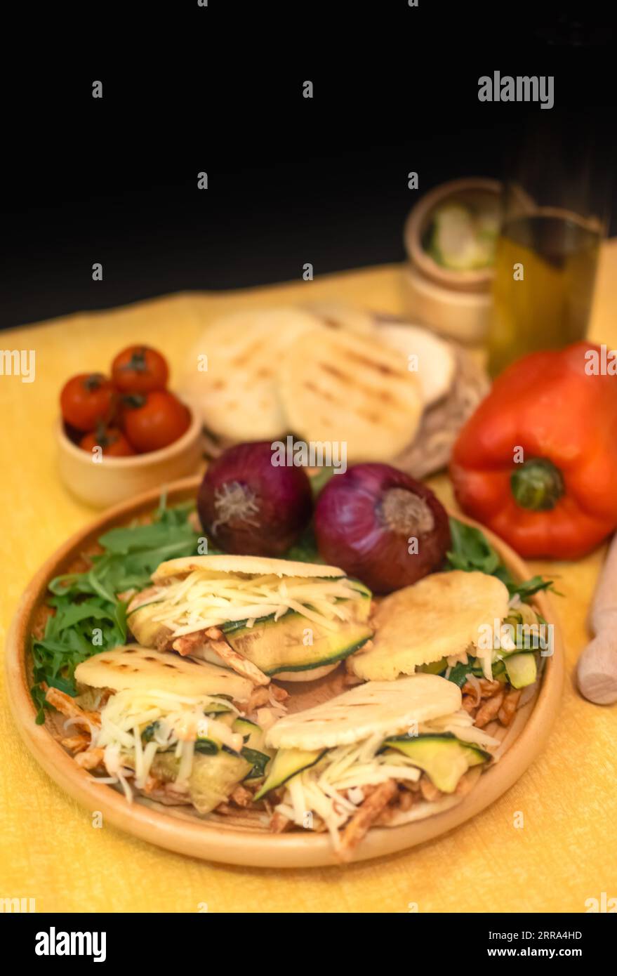 Traditional Arepas originating in Latin America, tasty stuffed corn ...