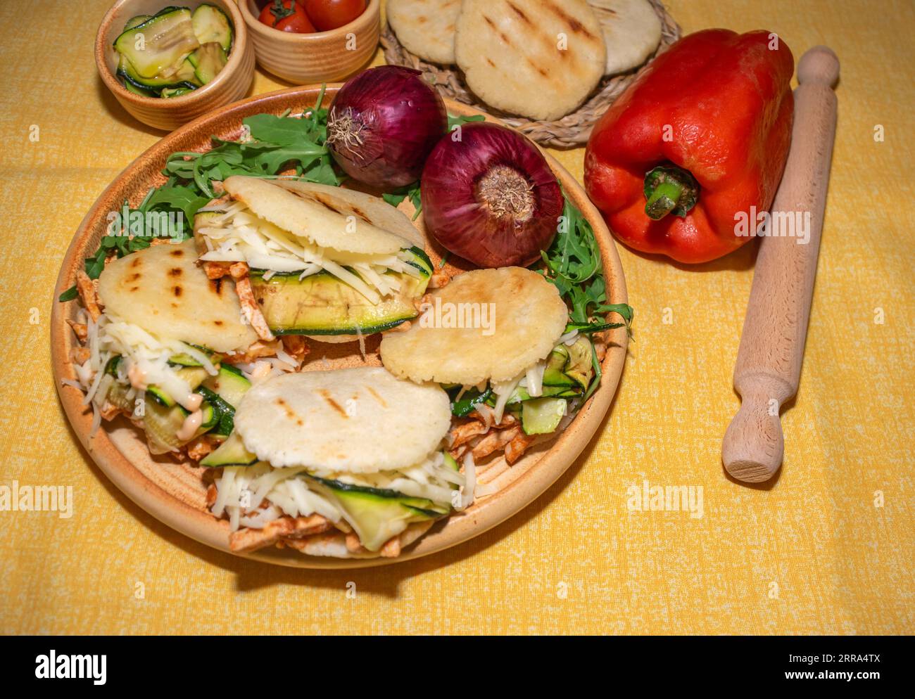 Traditional Arepas originating in Latin America, tasty stuffed corn ...