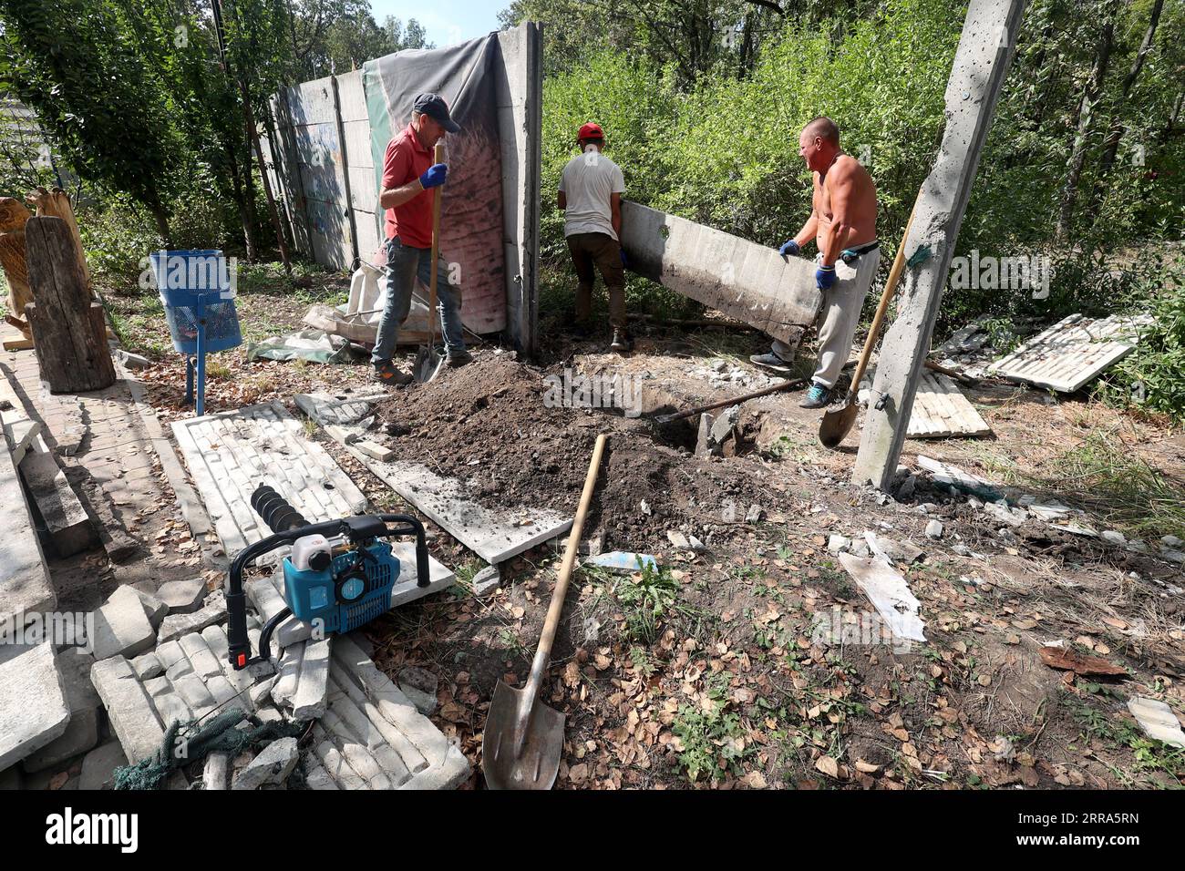 LISNE, UKRAINE - SEPTEMBER 6, 2023 - Workers remove the rubble as ...