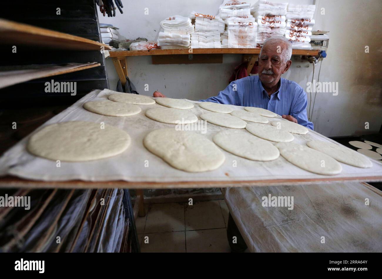 210717 -- SALFIT, July 17, 2021 -- Palestinian baker Yousef Shaheen ...