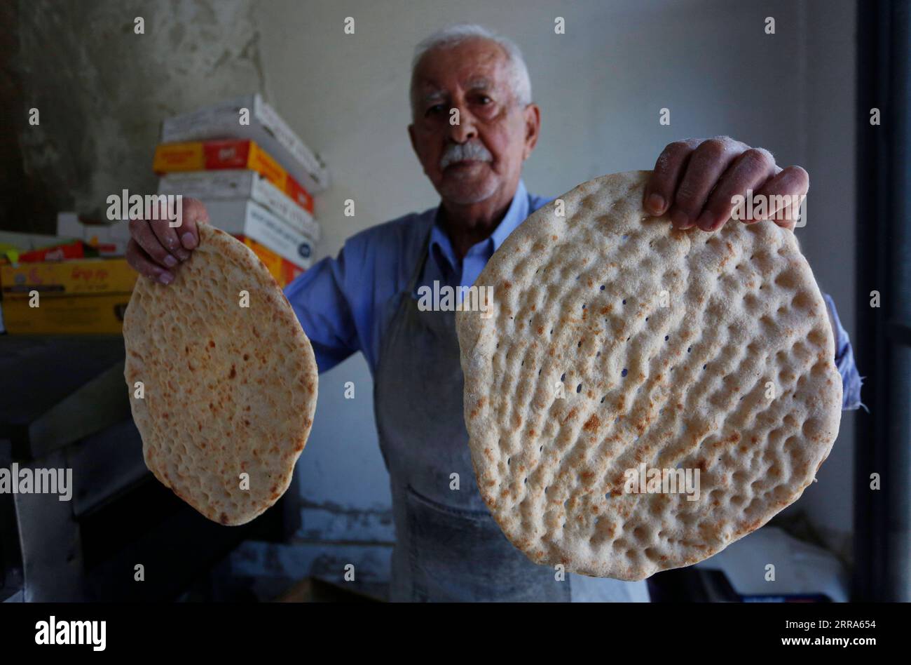 210717 -- SALFIT, July 17, 2021 -- Palestinian baker Yousef Shaheen ...