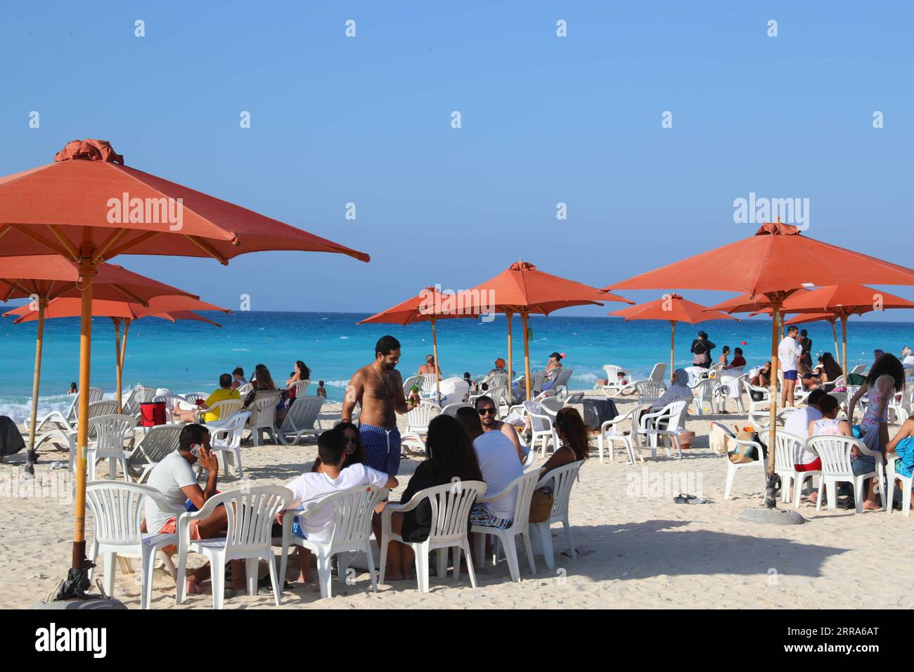 210718 -- EL ALAMEIN, July 18, 2021 -- People enjoy themselves on the ...