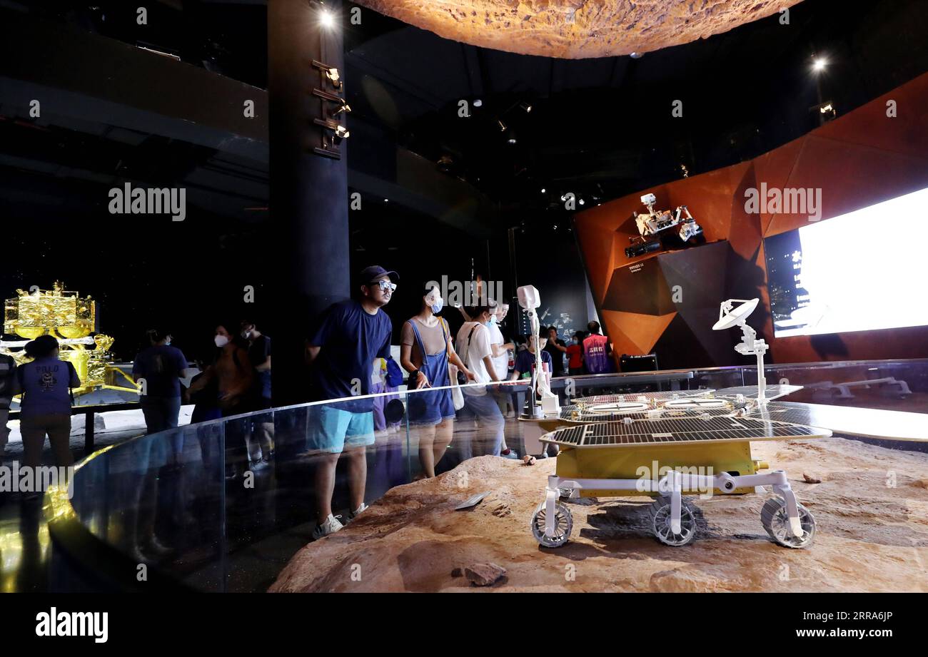 210718 -- SHANGHAI, July 18, 2021 -- People view a replica of China s ...