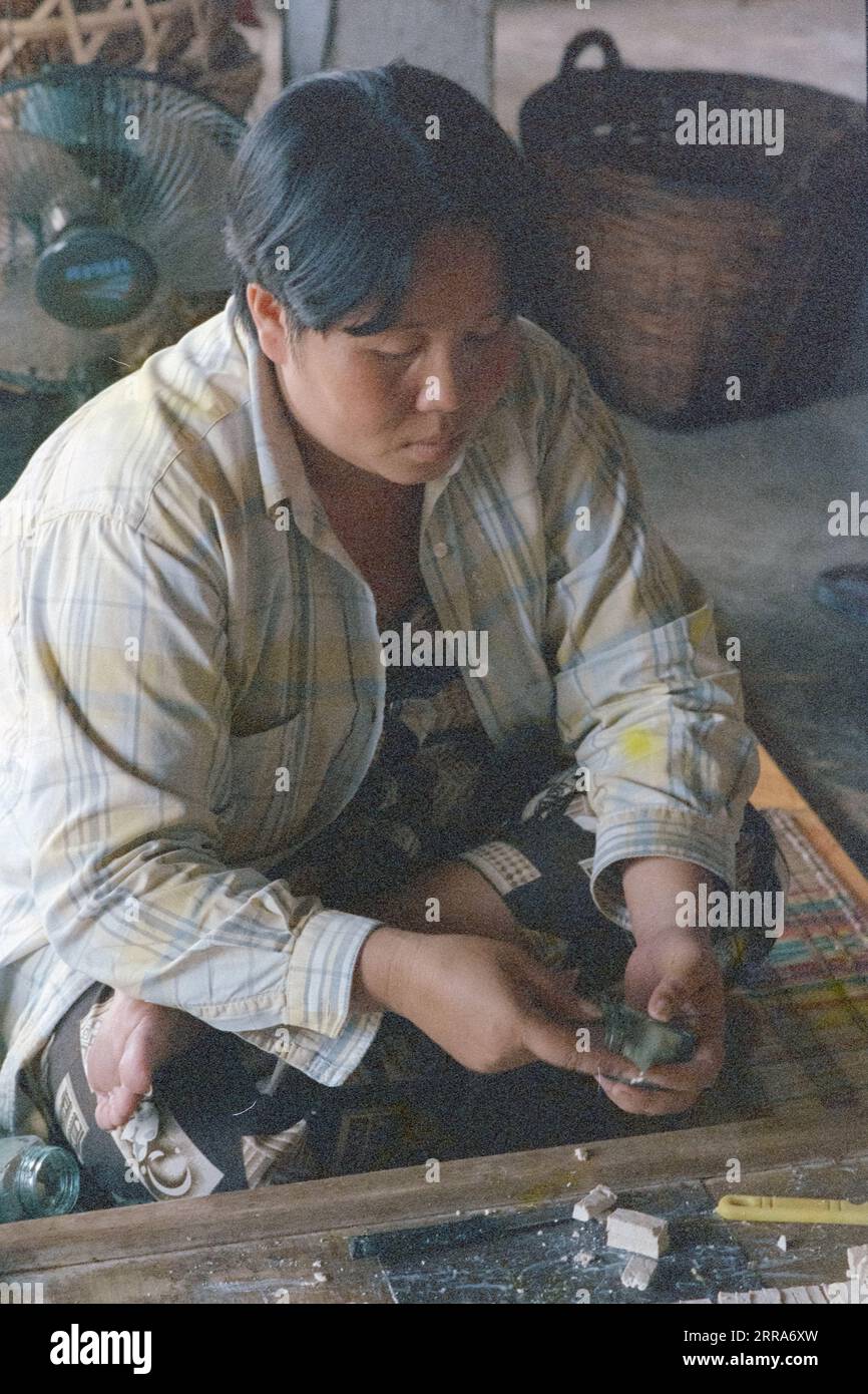 Local Vietnamese merchant selling goods on the streets of Saigon Stock ...