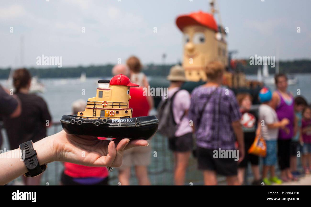 210718 -- HAMILTON CANADA, July 18, 2021 -- A visitor displays a toy of ...