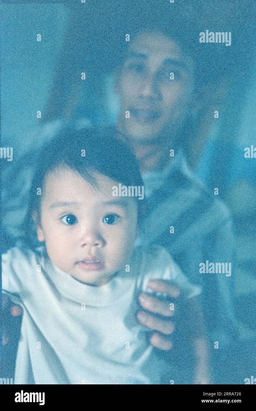 Vietnamese father proudly showing his little baby girl with a happy ...