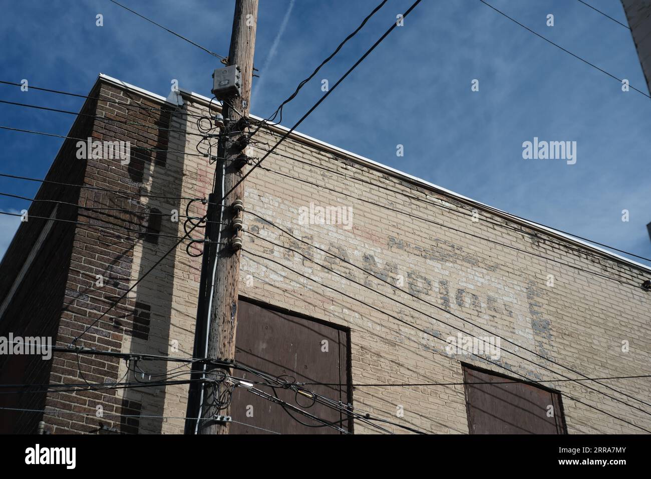Faded Champion spark plug sign painted on an old building in Bay City ...