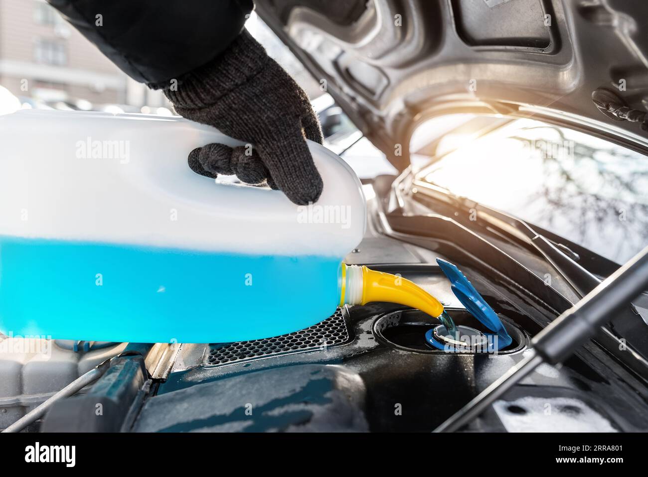 Pouring antifreeze coolant in radiator hi-res stock photography and ...