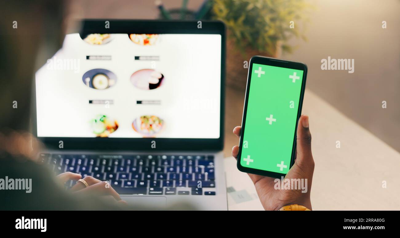 Laptop, green screen and phone in hands for food delivery order ...