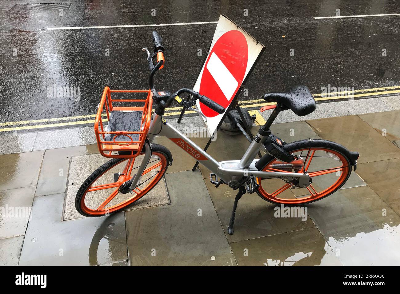 Wet pavement cycle hi-res stock photography and images - Alamy