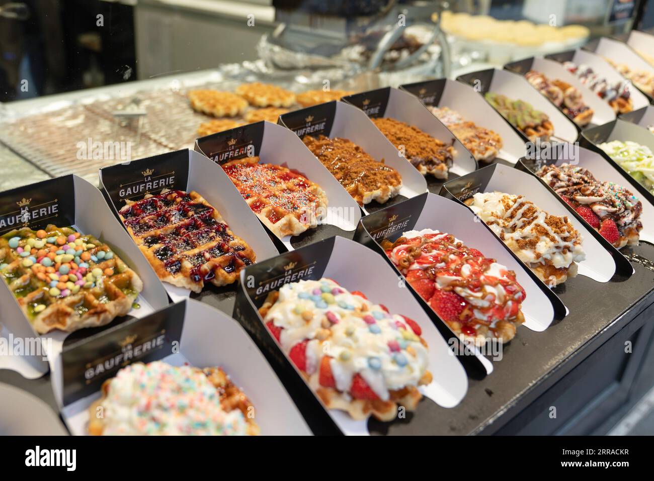 Brussels, Belgium - June 27 2023: Various types of waffles are on ...