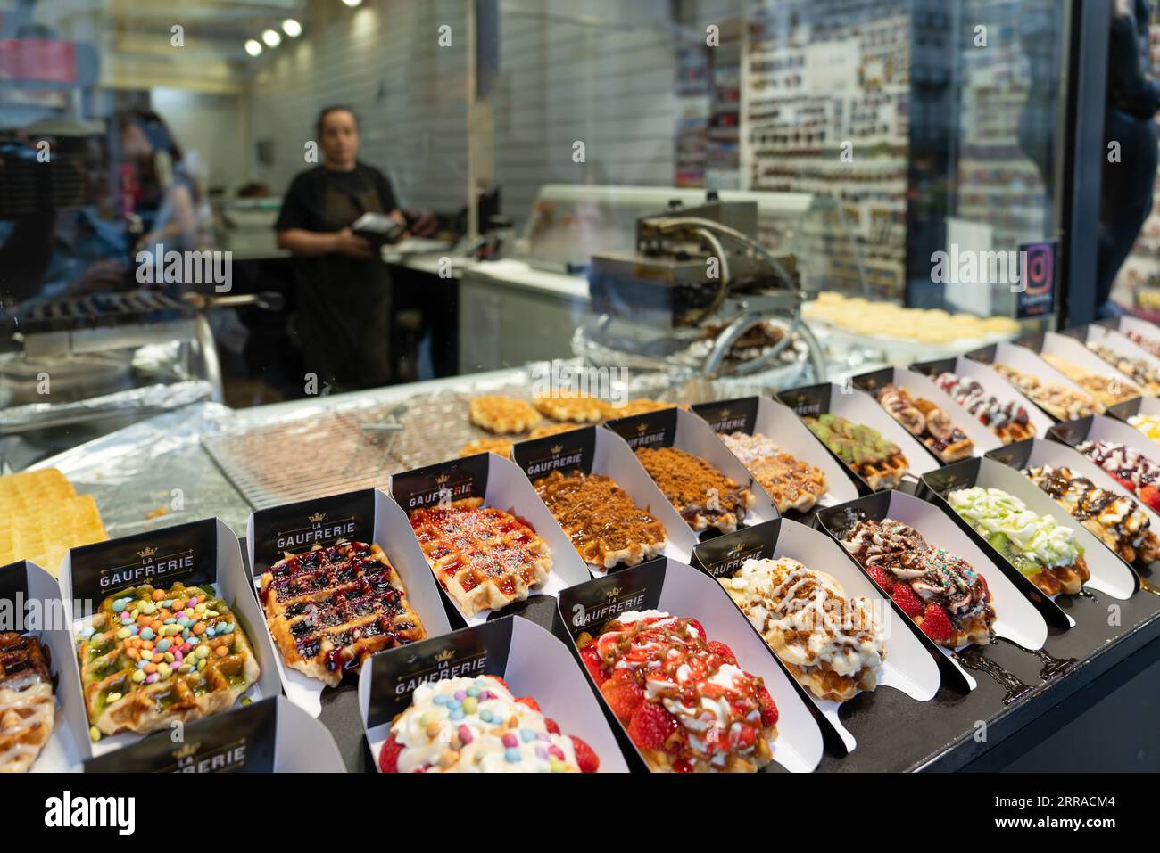 Brussels, Belgium - June 27 2023: Various types of waffles are on ...