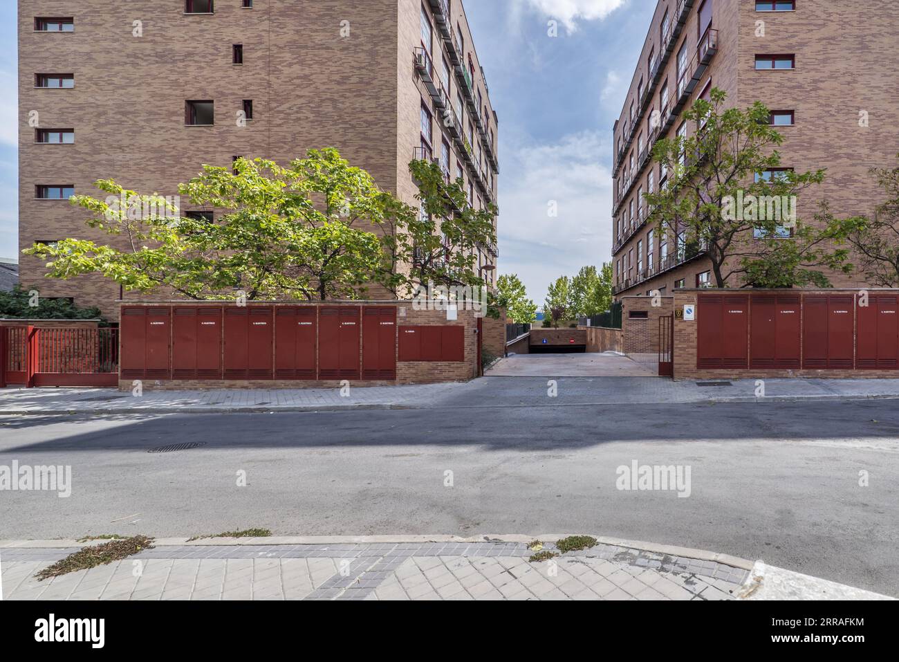 Facades of urban residential buildings with access to an underground ...