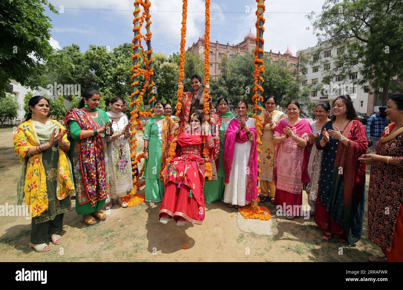 Woman on swing india hi-res stock photography and images - Alamy