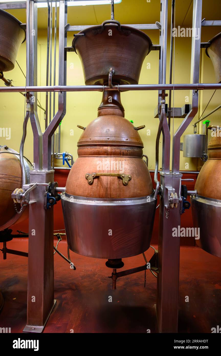 Gin alcoholic drink distillation process in copper tanks in Spanish ...
