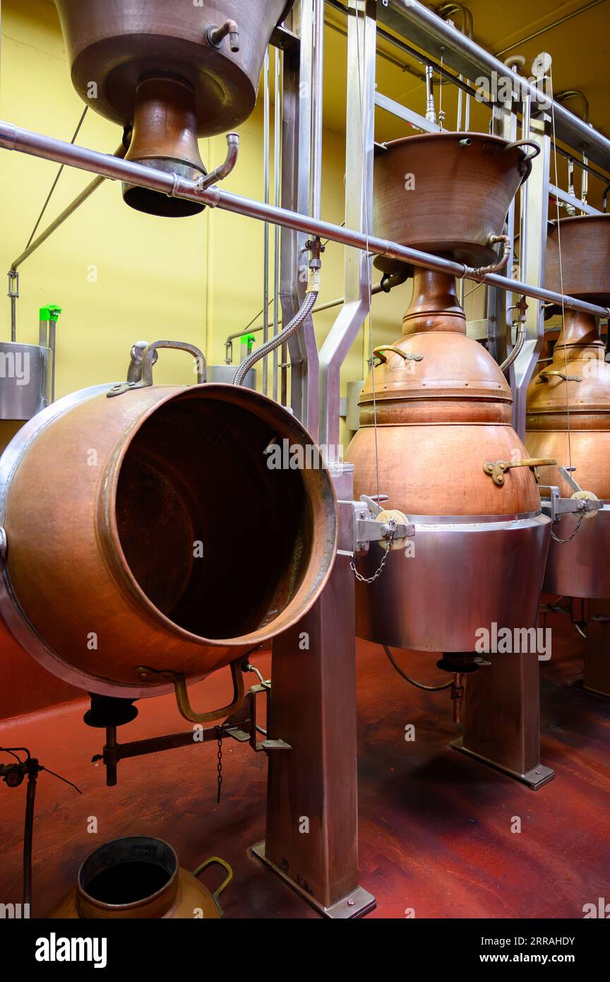 Gin alcoholic drink distillation process in copper tanks in Spanish ...