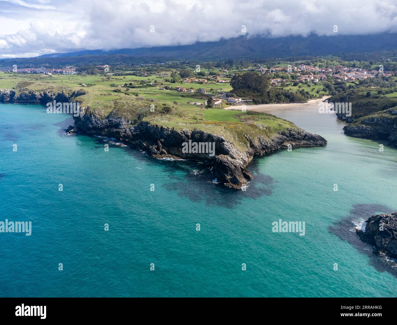 Aerial view on Playa de Poo during low tide near Llanes, Green coast of ...