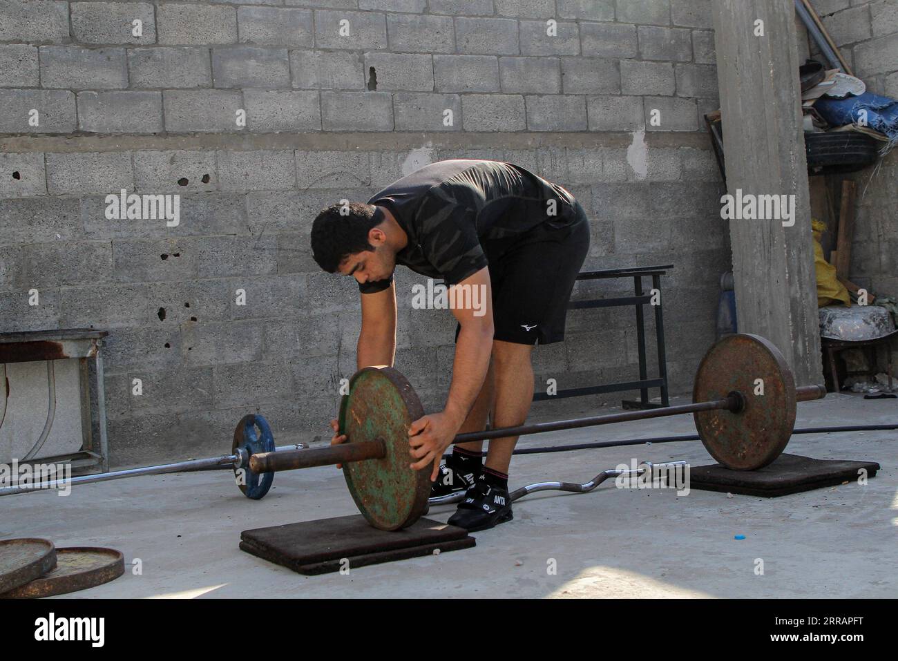 210812 -- GAZA, Aug. 12, 2021 -- Palestinian weightlifter Mohammed ...