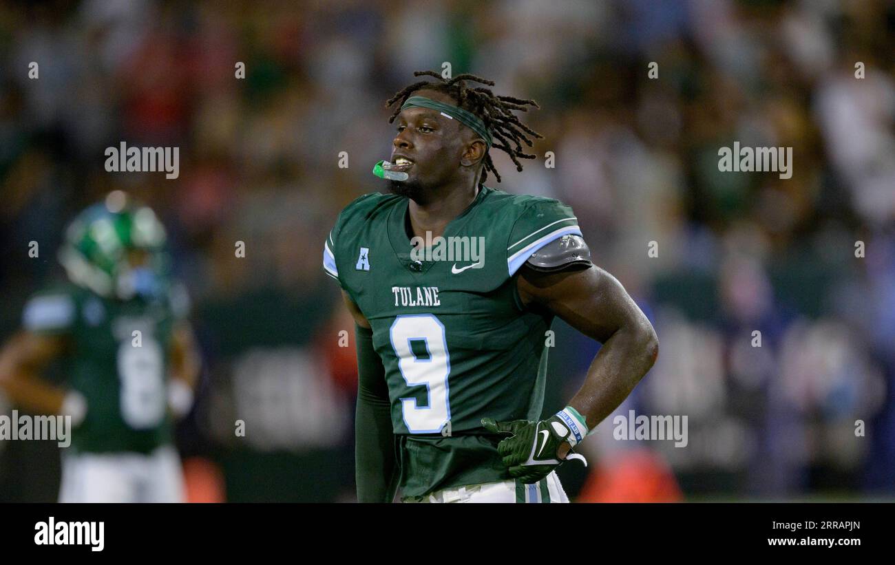 Tulane linebacker Corey Platt Jr. (9) runs off the field after his ...