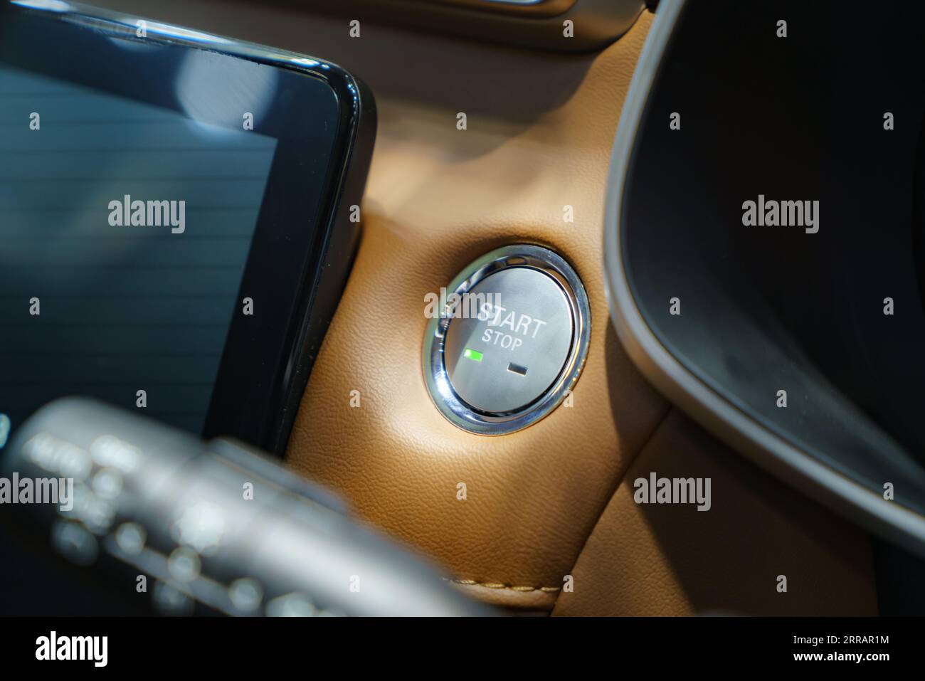 A tactile connection to power, Engine start button ignites life, while ...