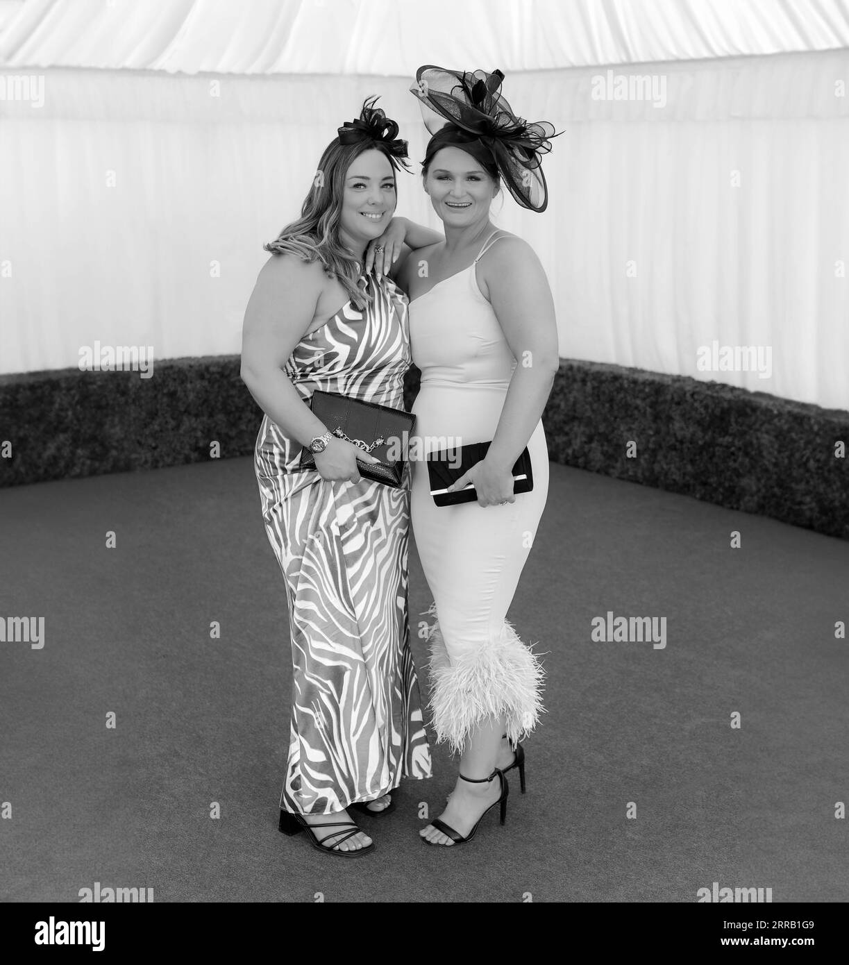 Delightful and beautiful couple enjoy Ladies Day at the races in ...