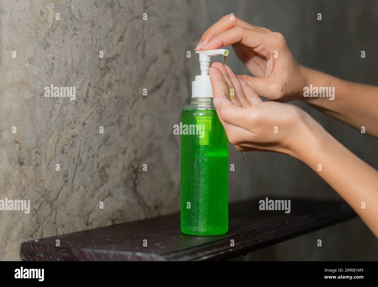 Hands using antibacterial soap hi-res stock photography and images - Alamy