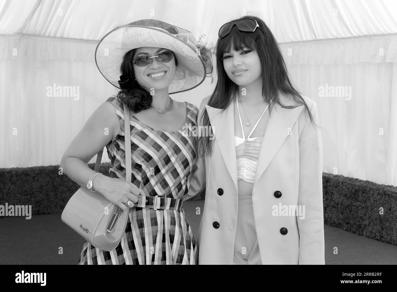 Delightful and beautiful couple enjoy Ladies Day at the races in ...