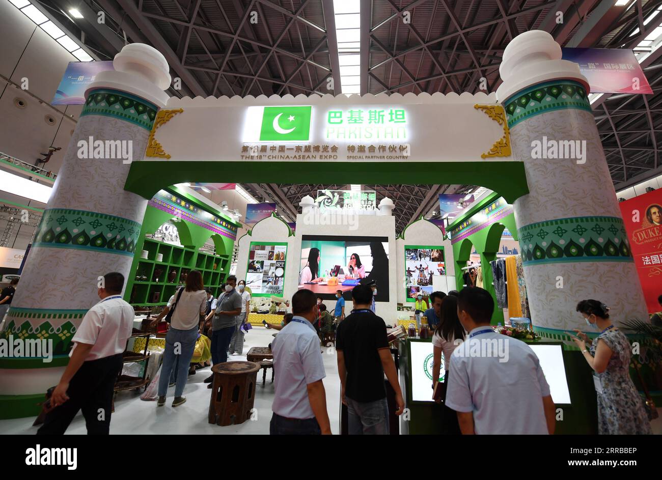 210912 -- NANNING, Sept. 12, 2021 -- People visit the booth of Pakistan ...
