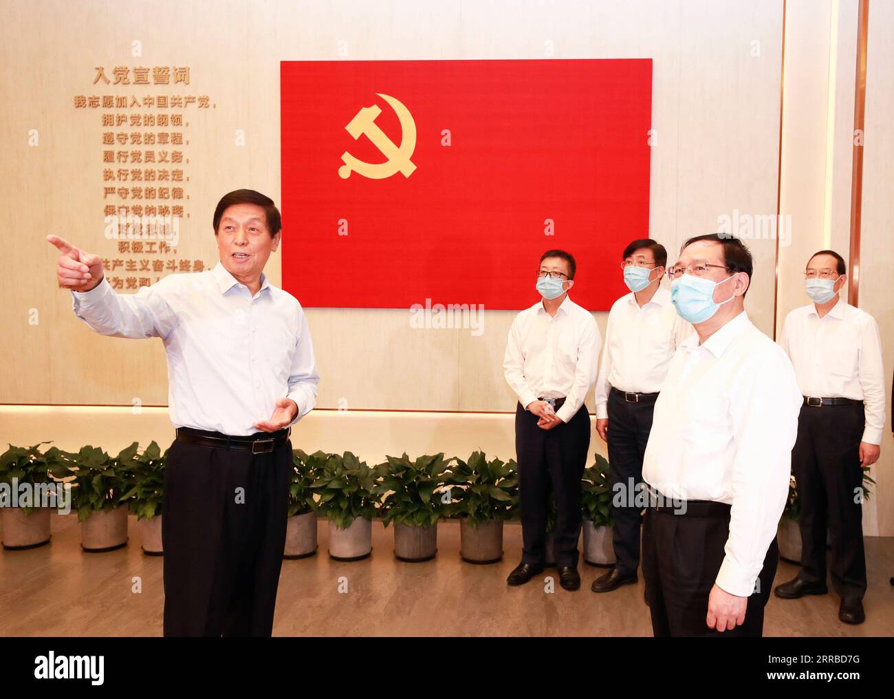 210915 -- SHANGHAI, Sept. 15, 2021 -- Li Zhanshu, a member of the ...