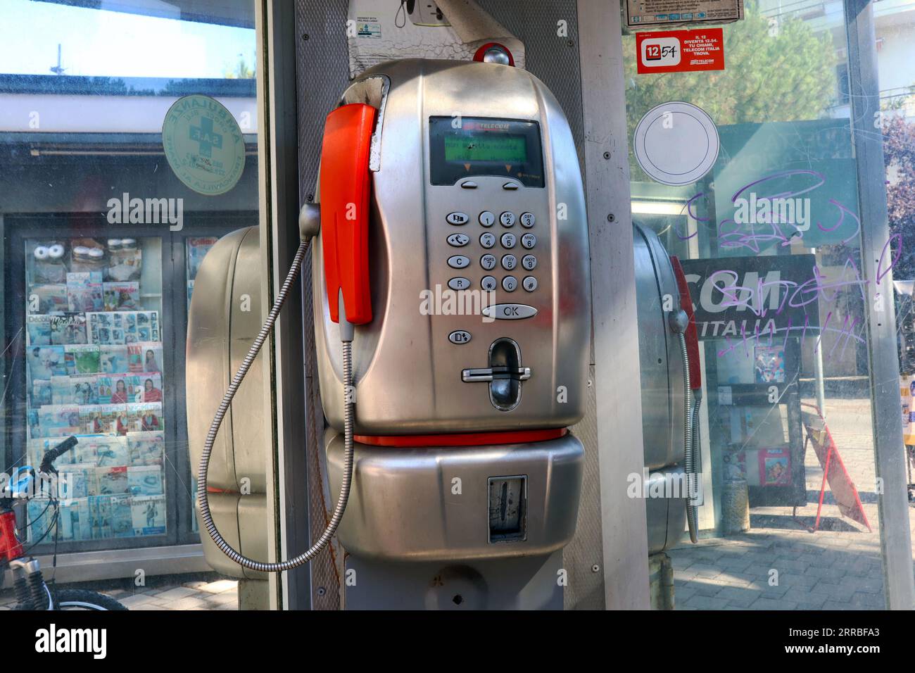 Italy – September 7, 2023: Public Telephone booth, operated by TIM S.p ...