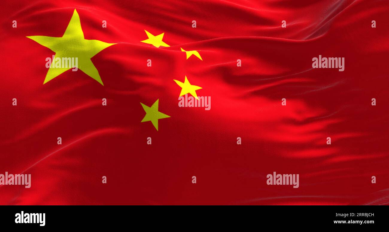 Close-up of national flag of China waving in the wind. Red background ...