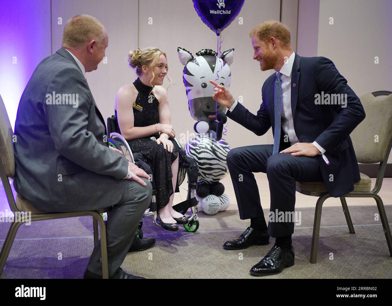 The Duke of Sussex speaks to Hayley and her father Stephen Cassin ...