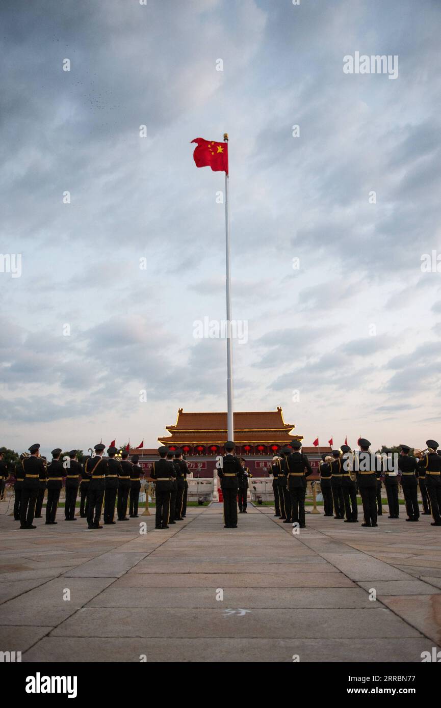 211001 -- BEIJING, Oct. 1, 2021 -- A flag-raising ceremony to celebrate ...