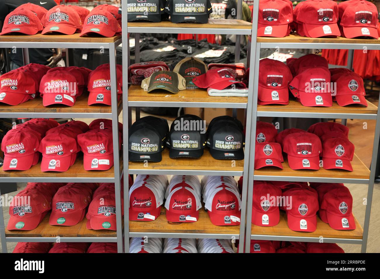 Baseball caps commemorating the Georgia Bulldogs football team's 2022 ...