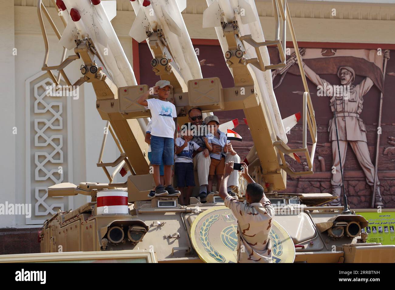 211007 -- CAIRO, Oct. 7, 2021 -- Children pose for photos at the 6th of ...