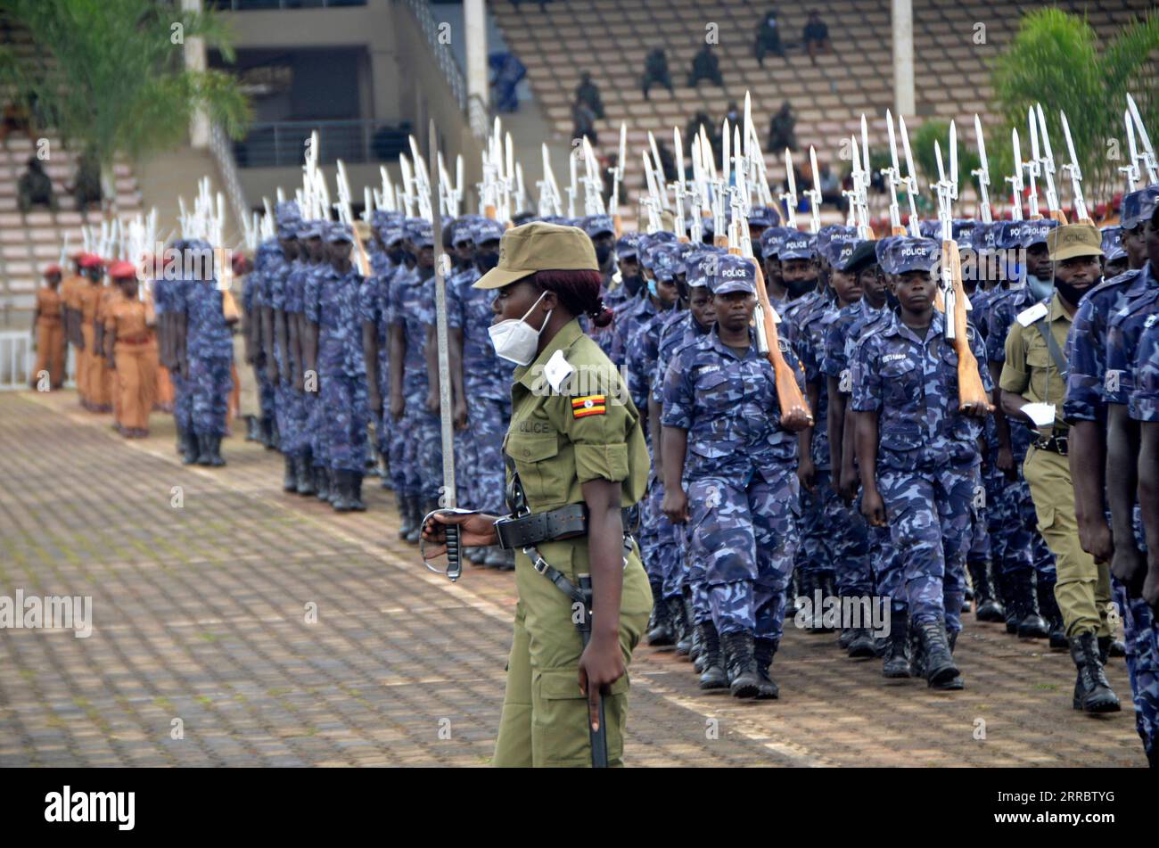 211007 -- KAMPALA, Oct. 7, 2021 -- Police personnel take part in a ...