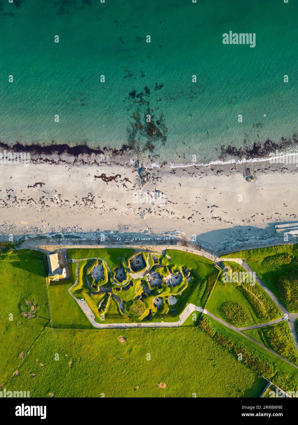 Aerial view of Skara Brae stone-built Neolithic settlement, located on ...