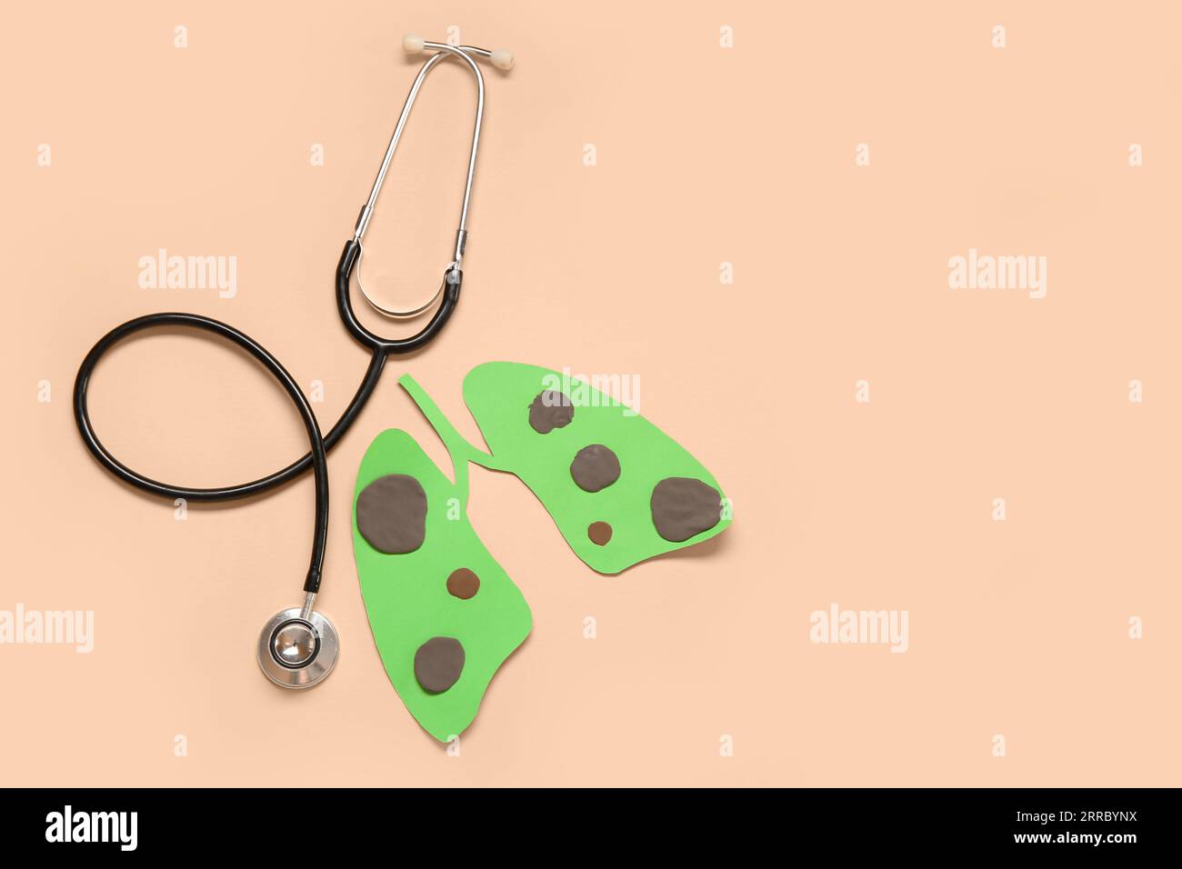 Paper lungs with tumors and stethoscope on beige background. Lung ...