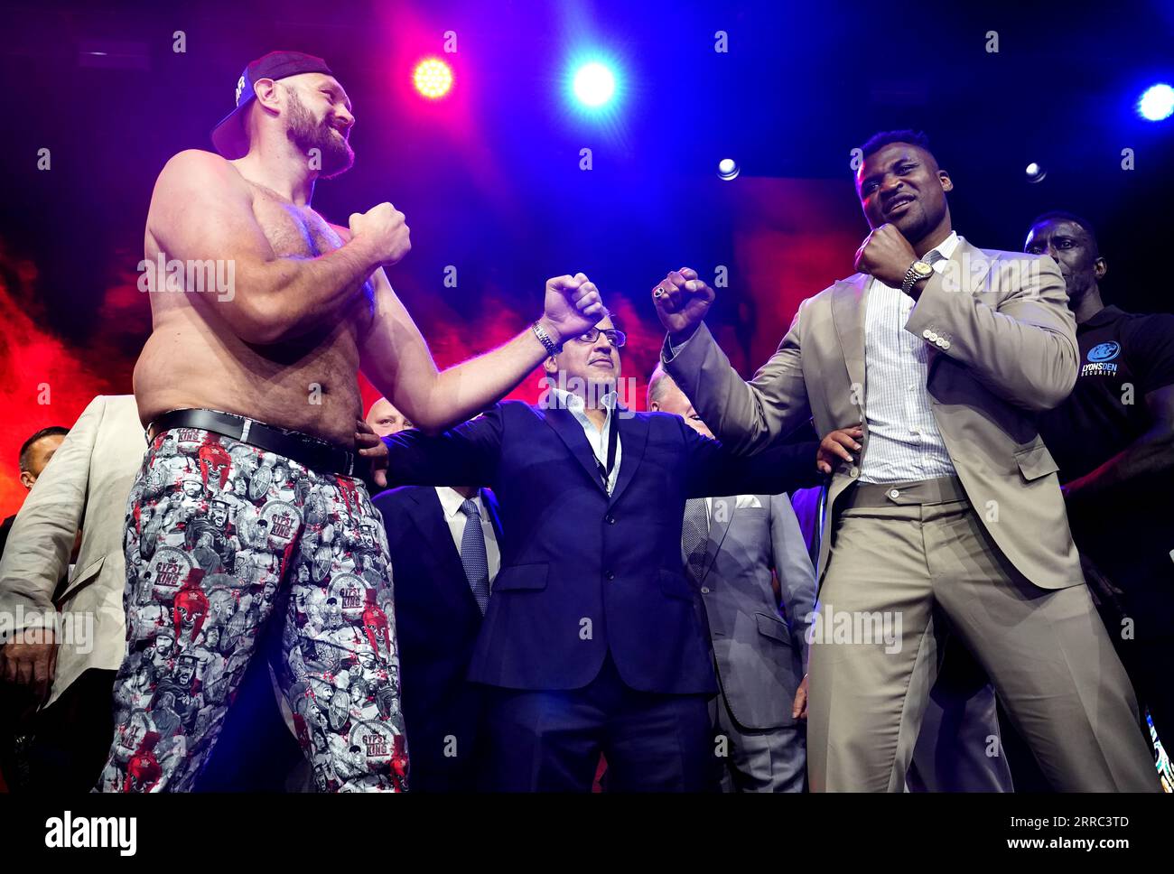 Tyson Fury (left) and Francis Ngannou (right) during a press conference ...