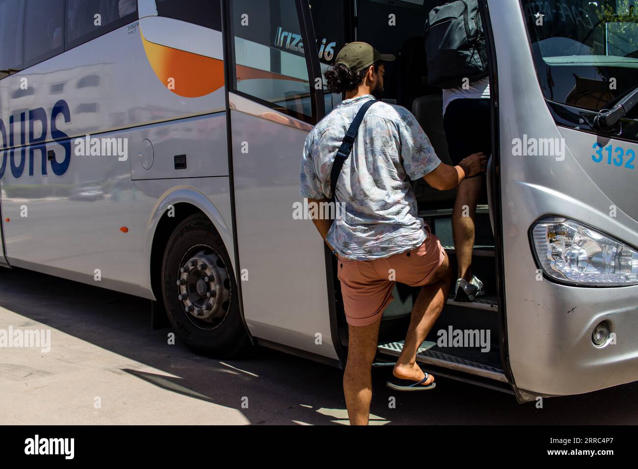 Marrakech, Morocco - August 28, 2023 People traveling in a Supratours ...
