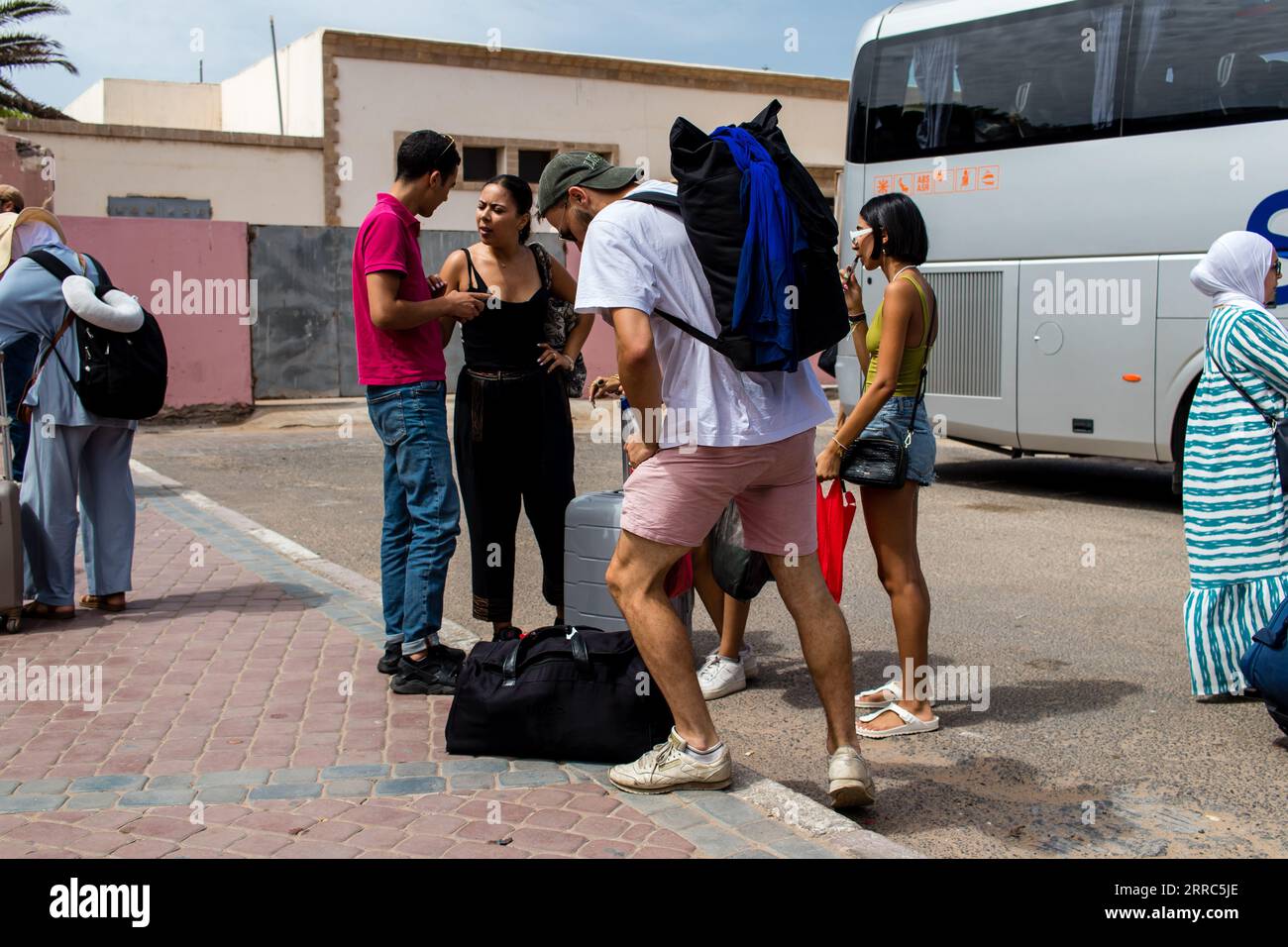 Marrakech, Morocco - August 28, 2023 People traveling in a Supratours ...