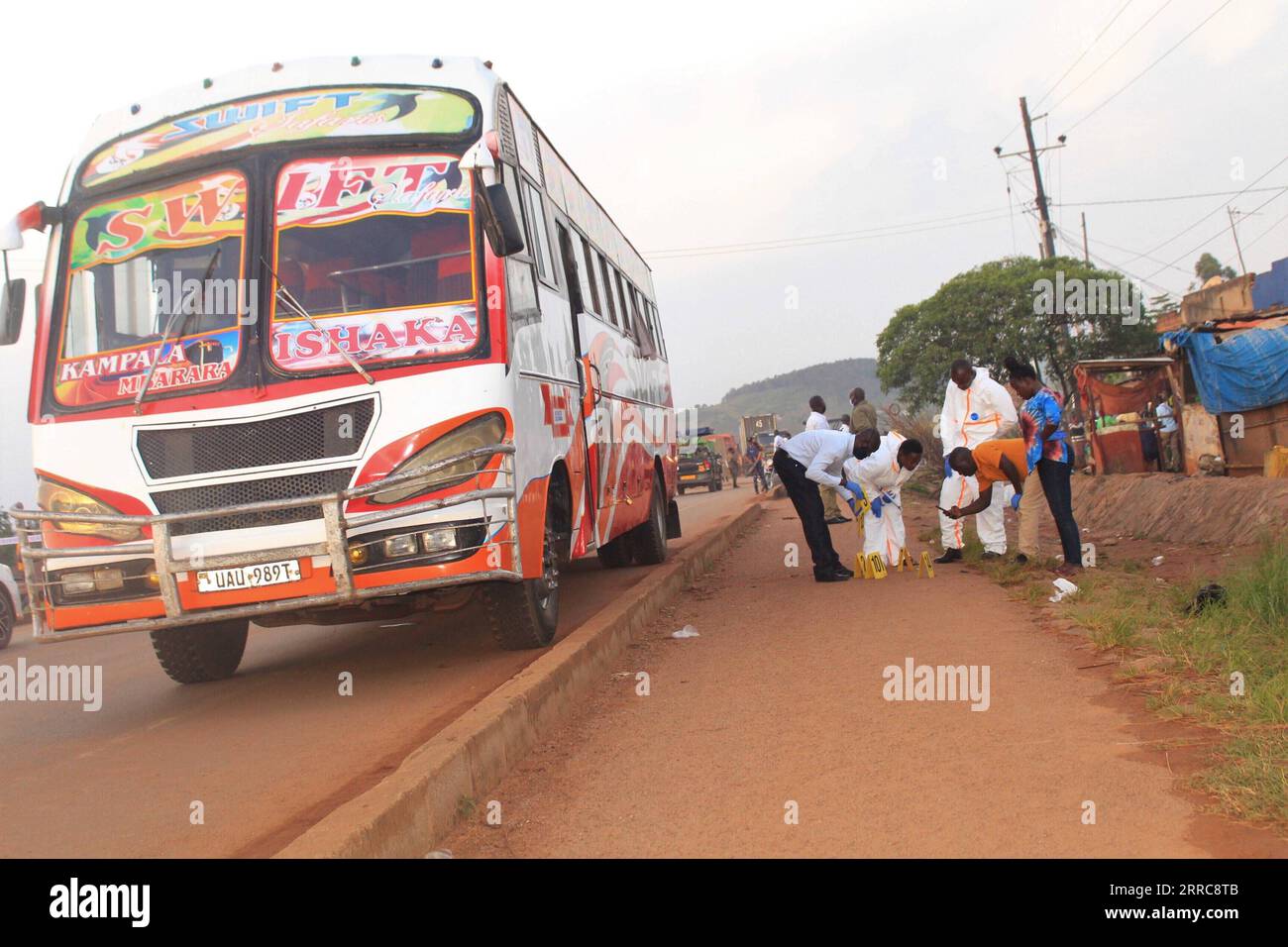 211025 -- MPIGI UGANDA, Oct. 25, 2021 -- Investigators work at the ...