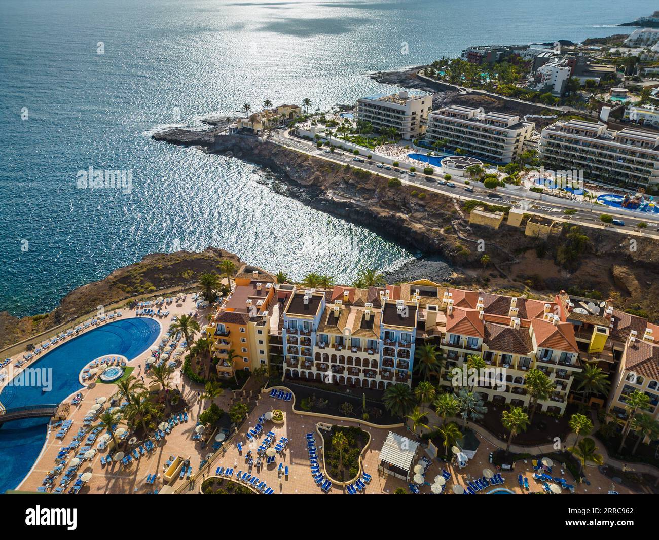ocean blue waterand luxury hotels of Playa Paraiso, Tenerife, Canary ...
