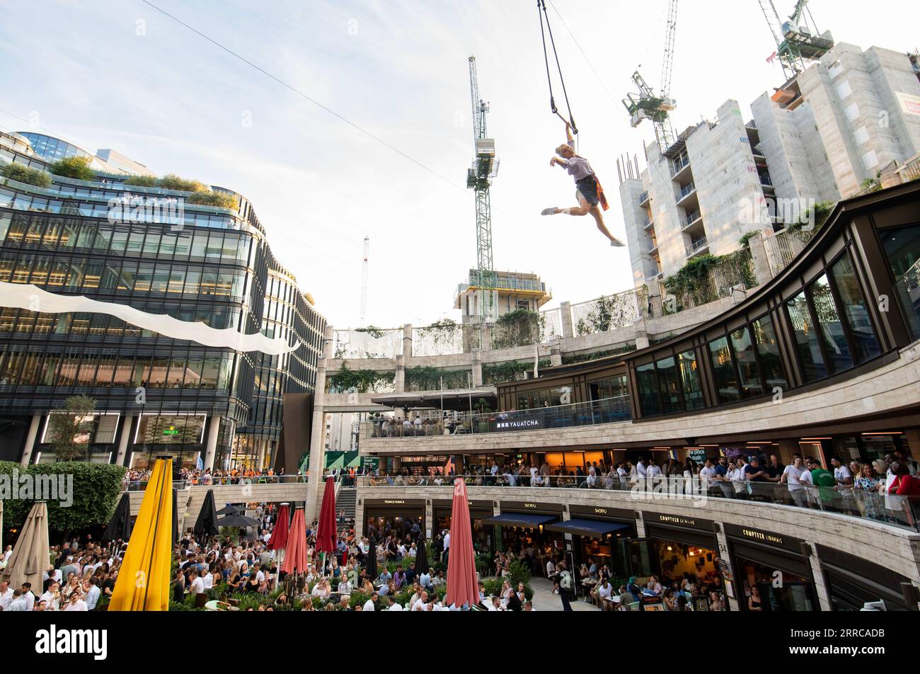 EDITORIAL USE ONLY Performers take part in Dinner for All, an immersive ...