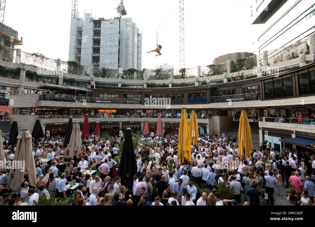 EDITORIAL USE ONLY Performers take part in Dinner for All, an immersive ...