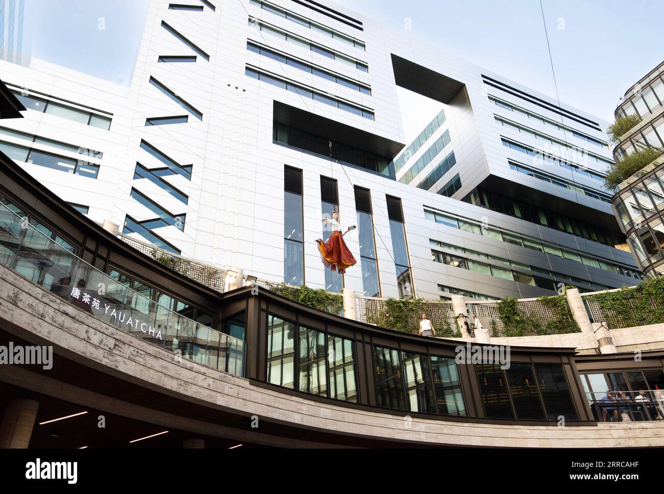 EDITORIAL USE ONLY Performers take part in Dinner for All, an immersive ...