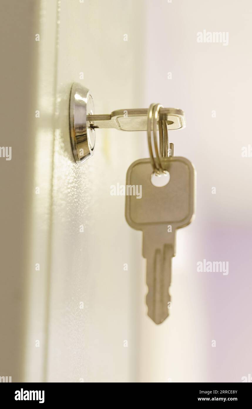 Locker with a key for a security system in a public facility. Vertical ...