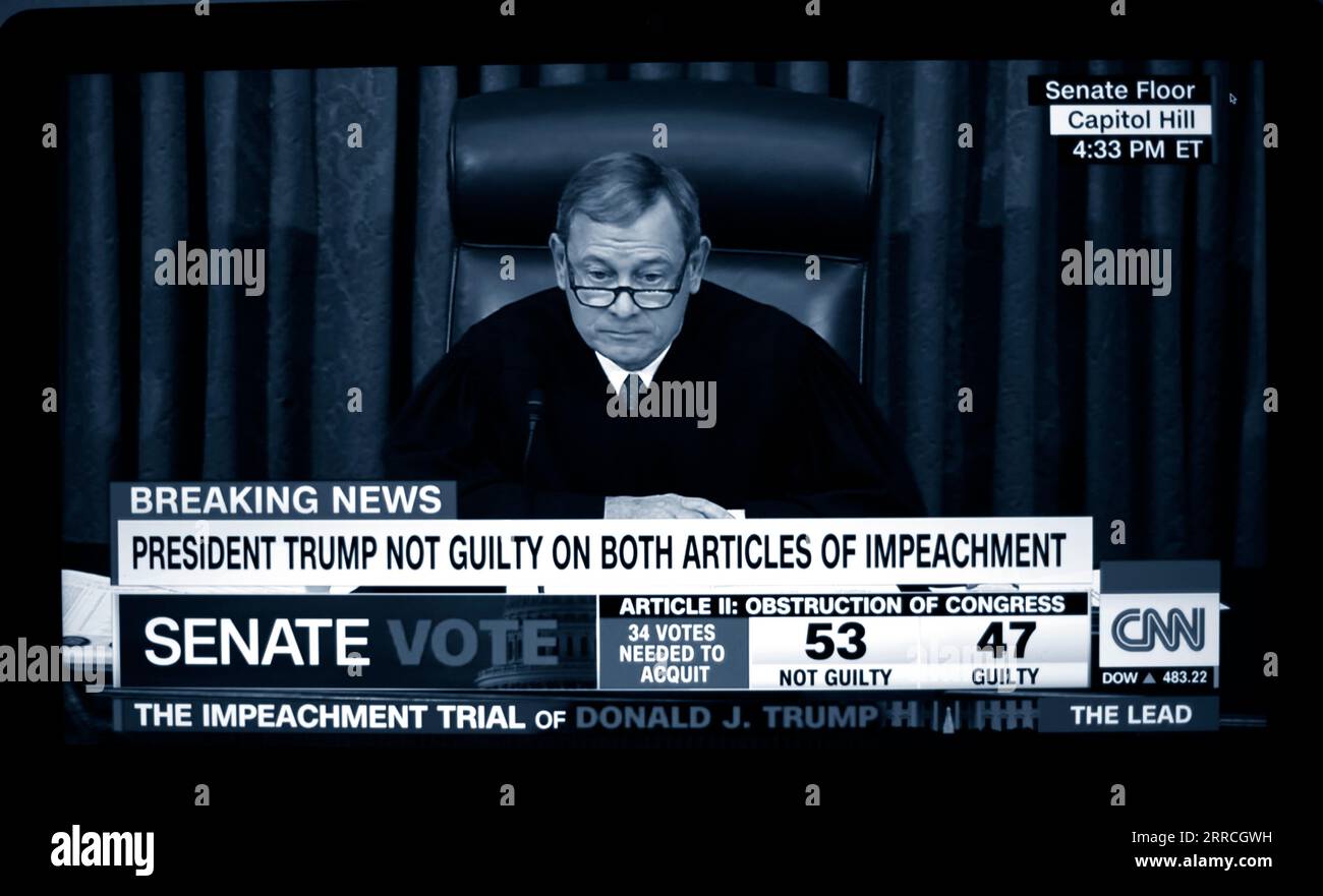 A TV screen shot (digitally colorized) of CNN live coverage reporting ...