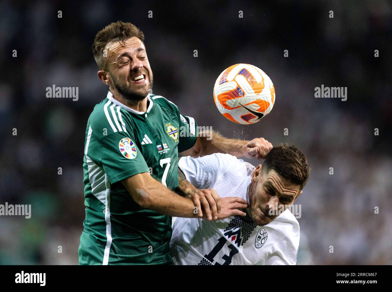 Northern Ireland's Conor McMenamin (left) and Slovenia's Erik Janza ...